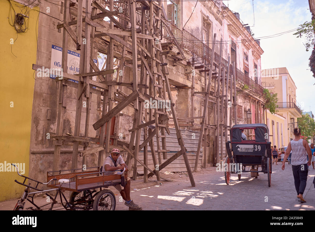 Wooden scaffolding supports a derelict building in Havana, Cuba Stock ...