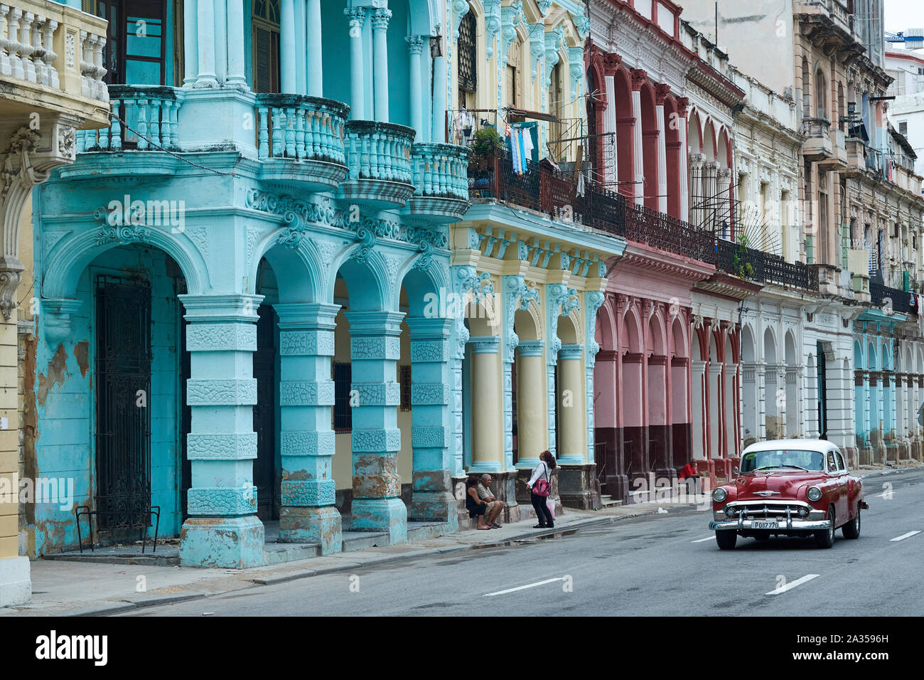 Colourful colonial buildings and classic cars are distinctive ...