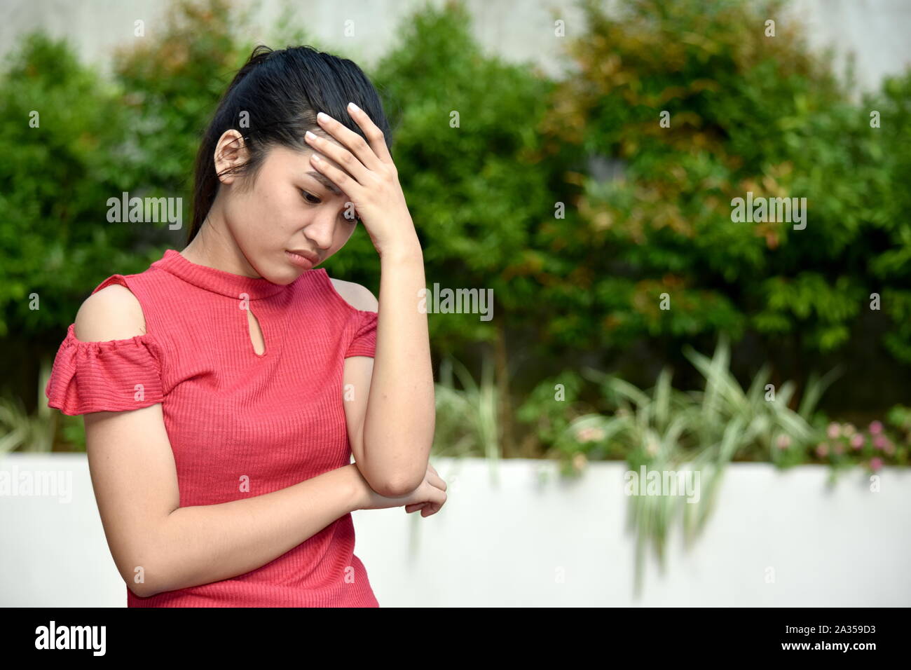 A Worried Cute Minority Teenage Female Stock Photo - Alamy