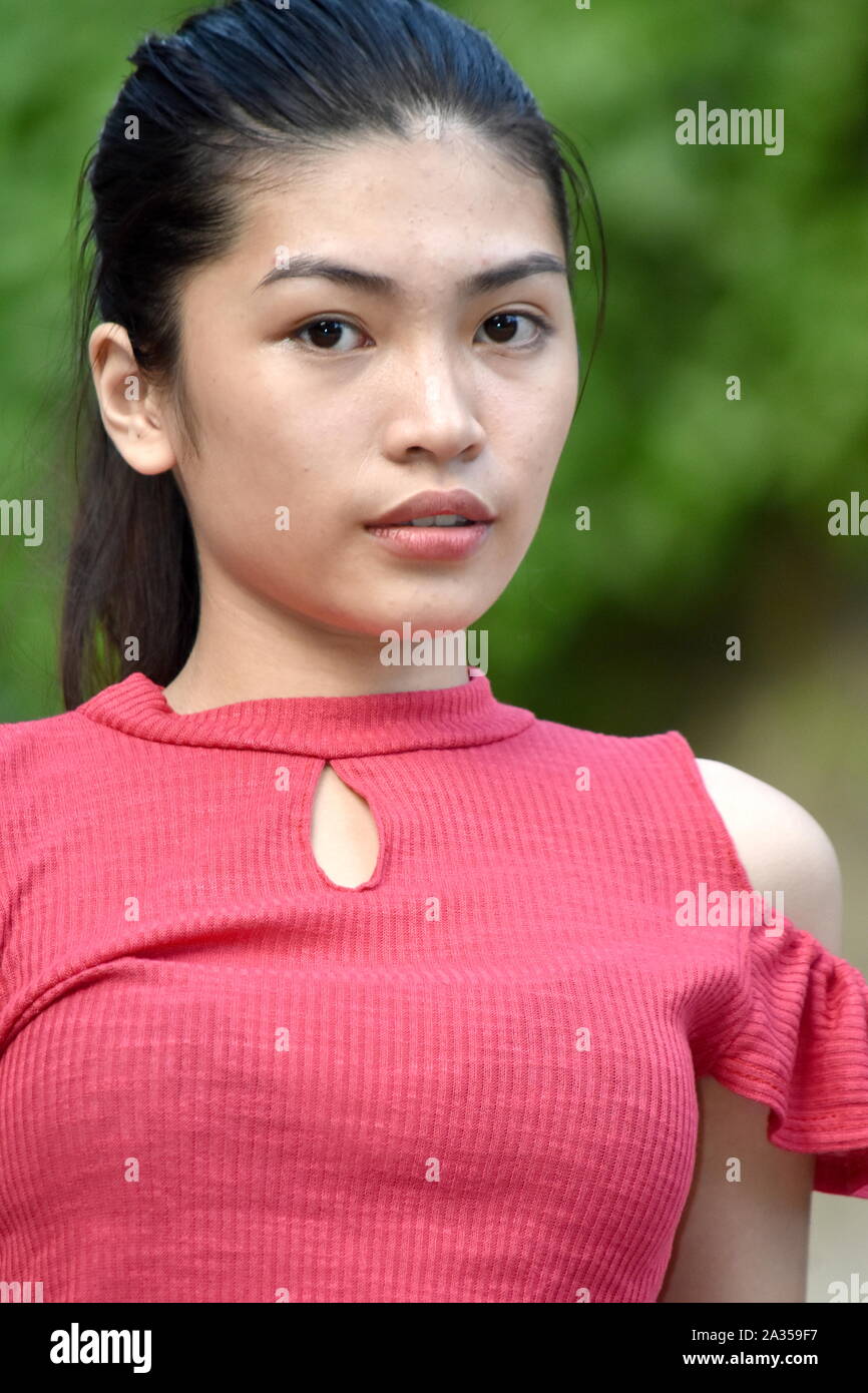 An Unemotional Pretty Minority Teen Girl Stock Photo - Alamy