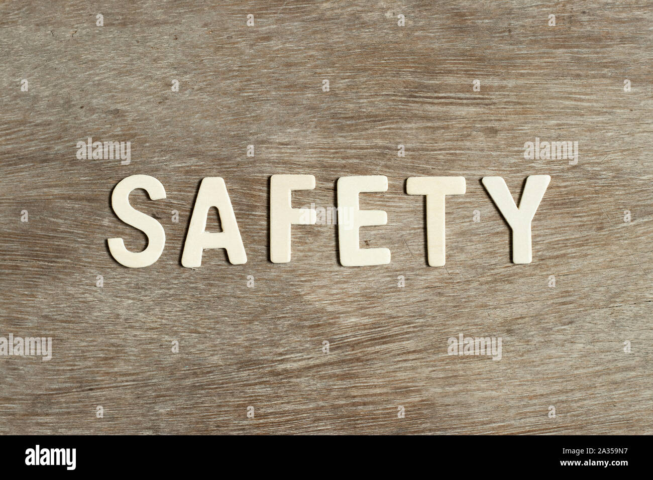 Alphabet letter in word safety on wood background Stock Photo - Alamy