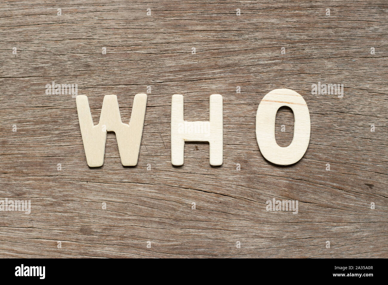 Alphabet letter in word who on wood background Stock Photo - Alamy