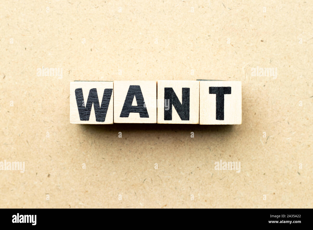 Letter block in word want on wood background Stock Photo - Alamy