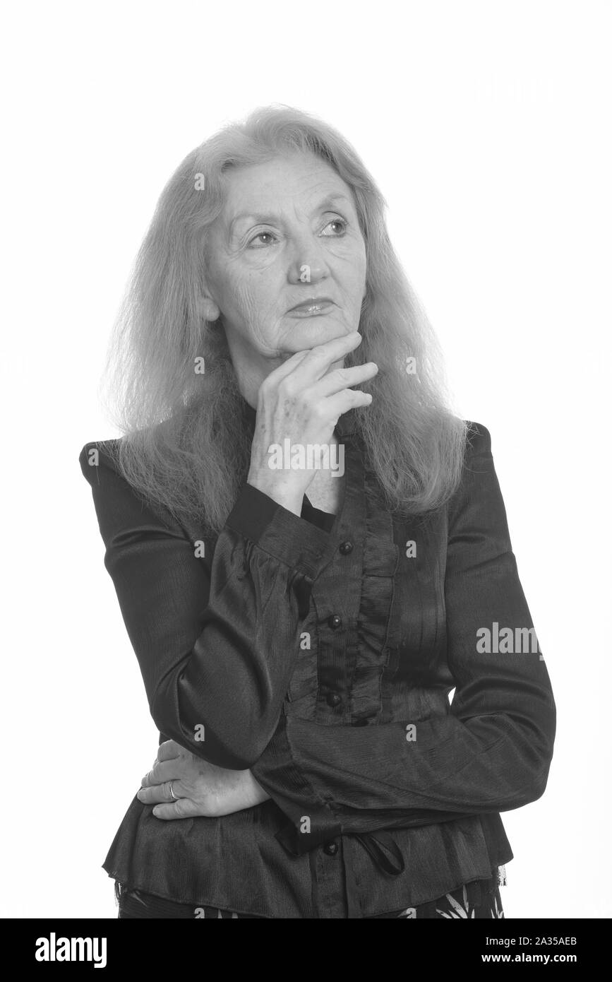 Elderly woman thinking black and white hi-res stock photography and ...