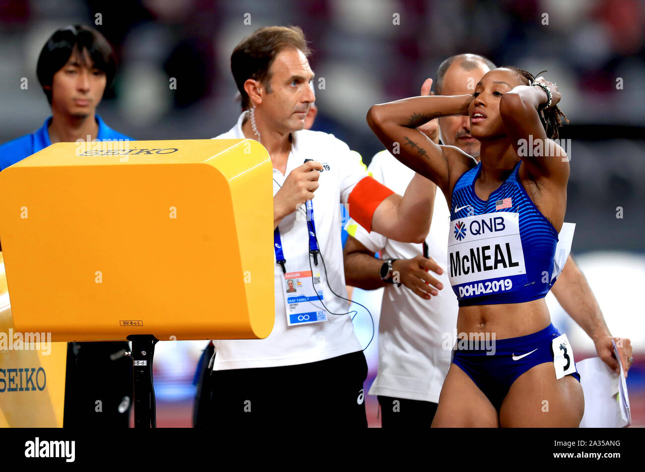 USA's Brianna McNeal reacts as she's disqualified after a false start ...