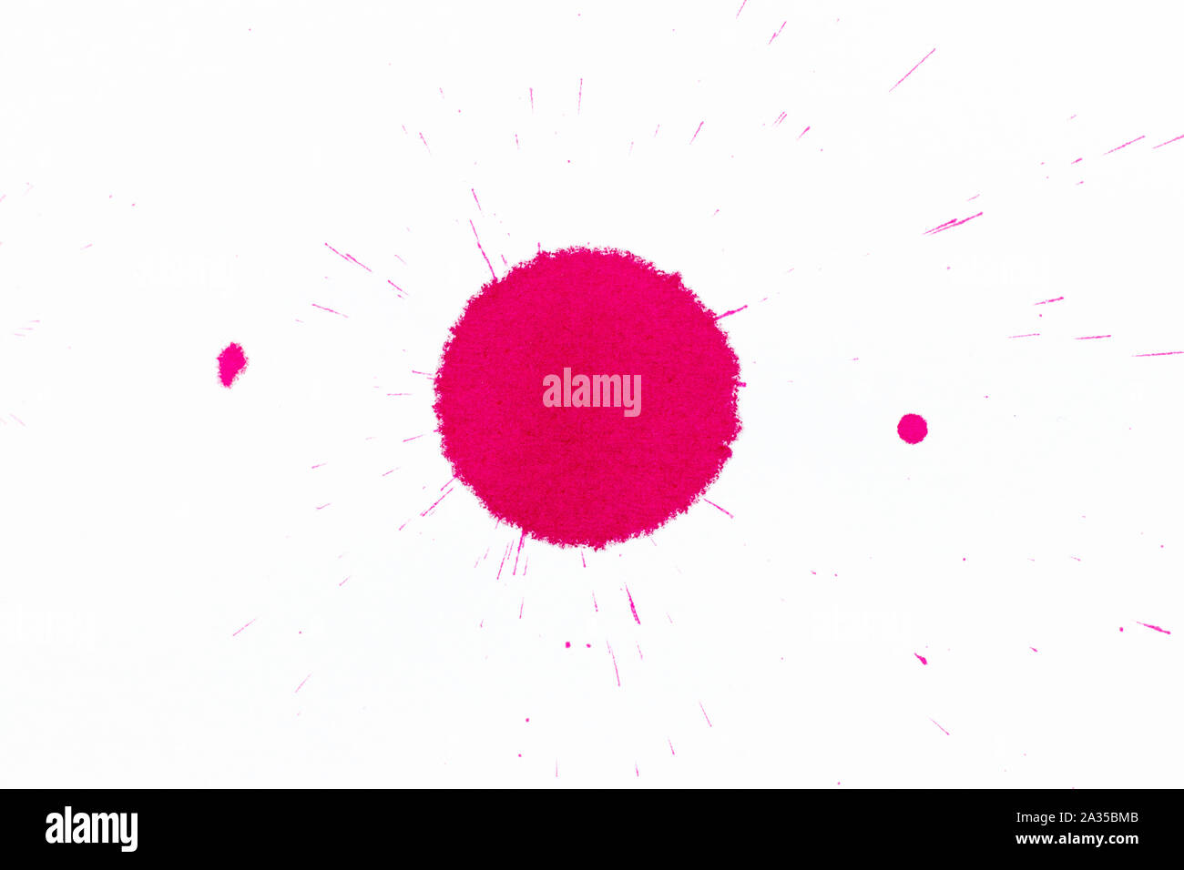 Red ink dot splashed on white paper background Stock Photo - Alamy