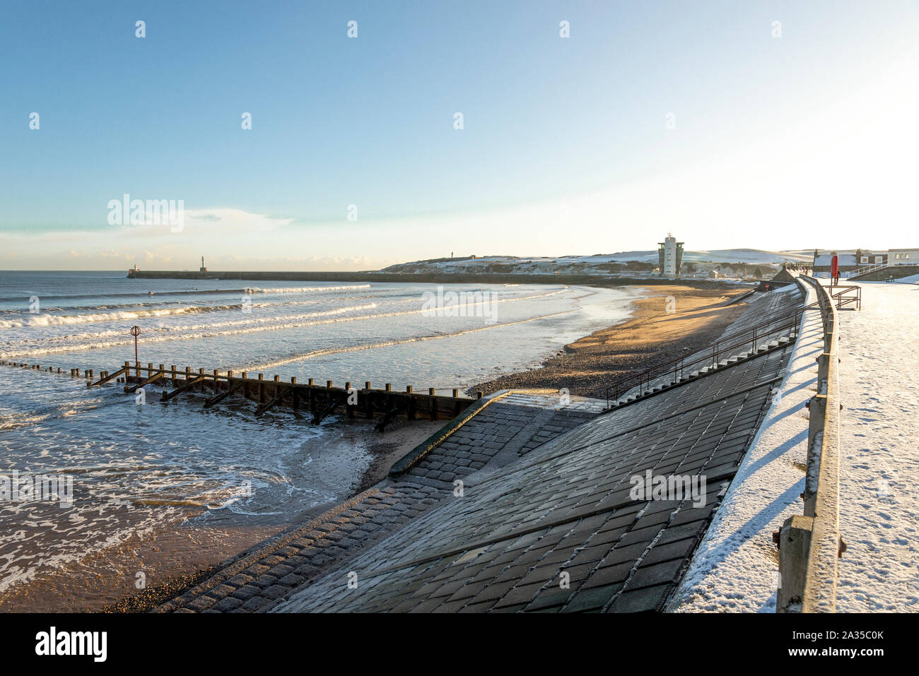 Aberdeen beach view with South Breakwater lighthouses and shipping ...