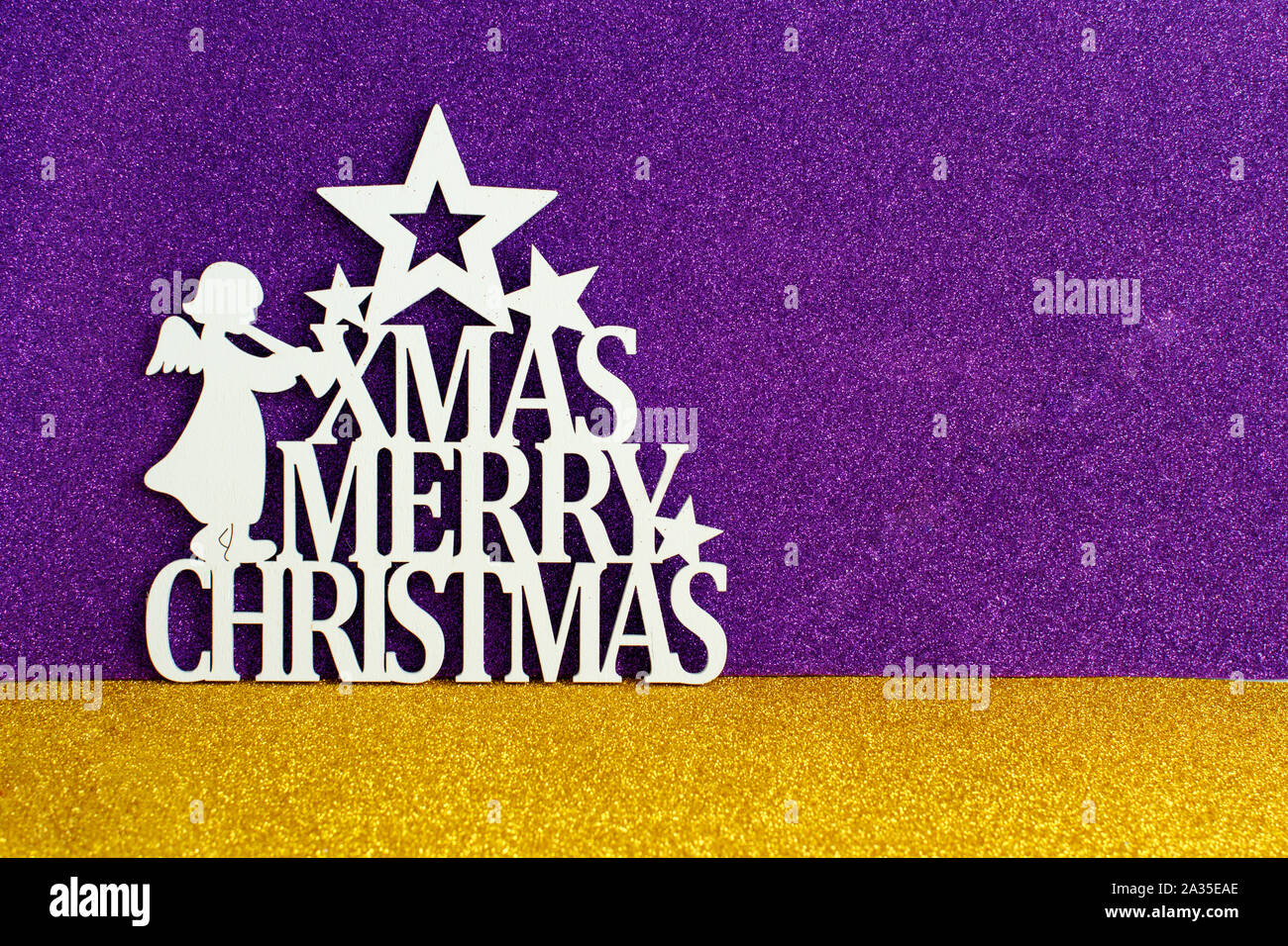 White Christmas sign with Golden and purple background Stock Photo - Alamy
