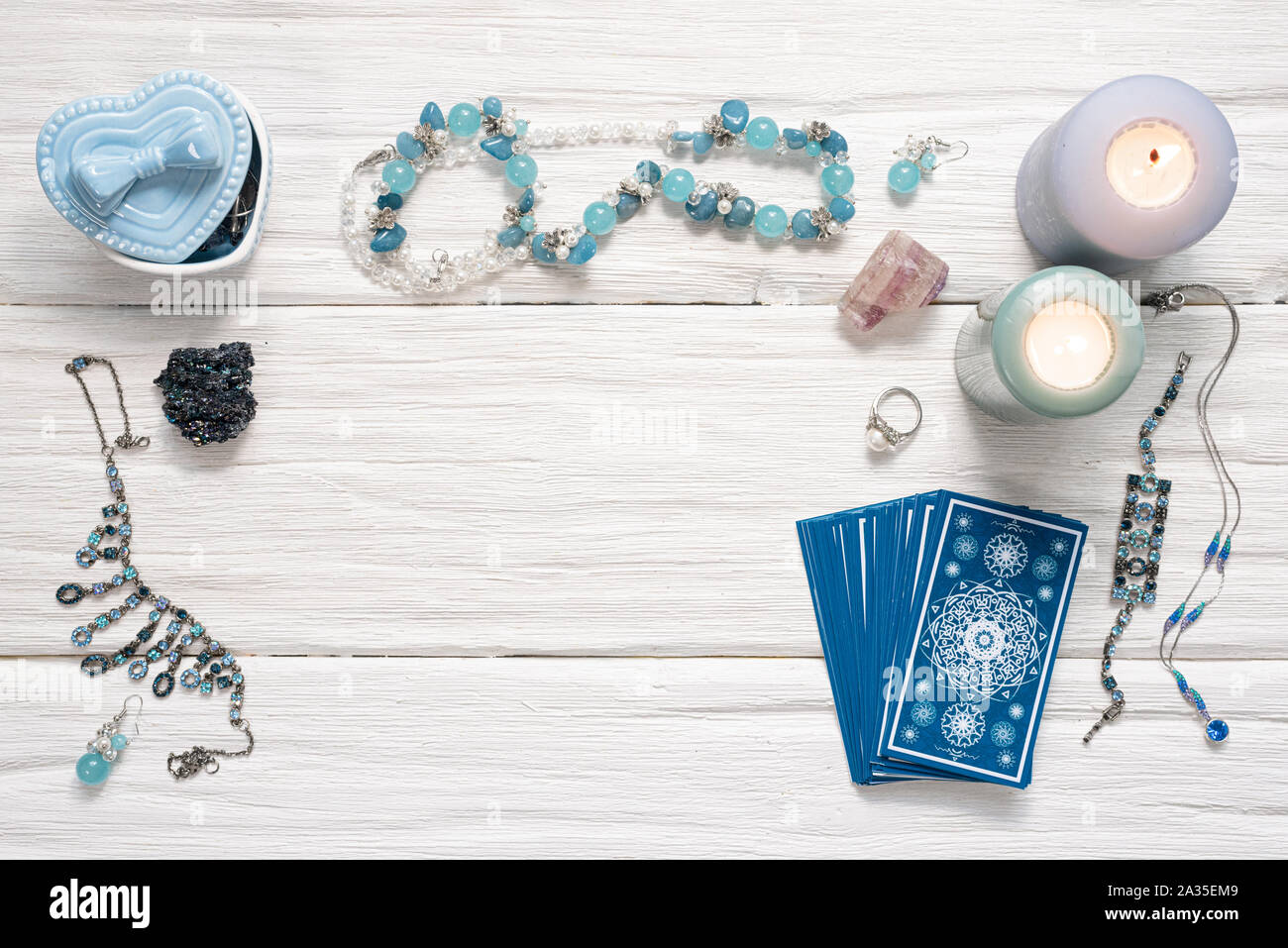 Blue tarot cards on white wooden table background Stock Photo - Alamy