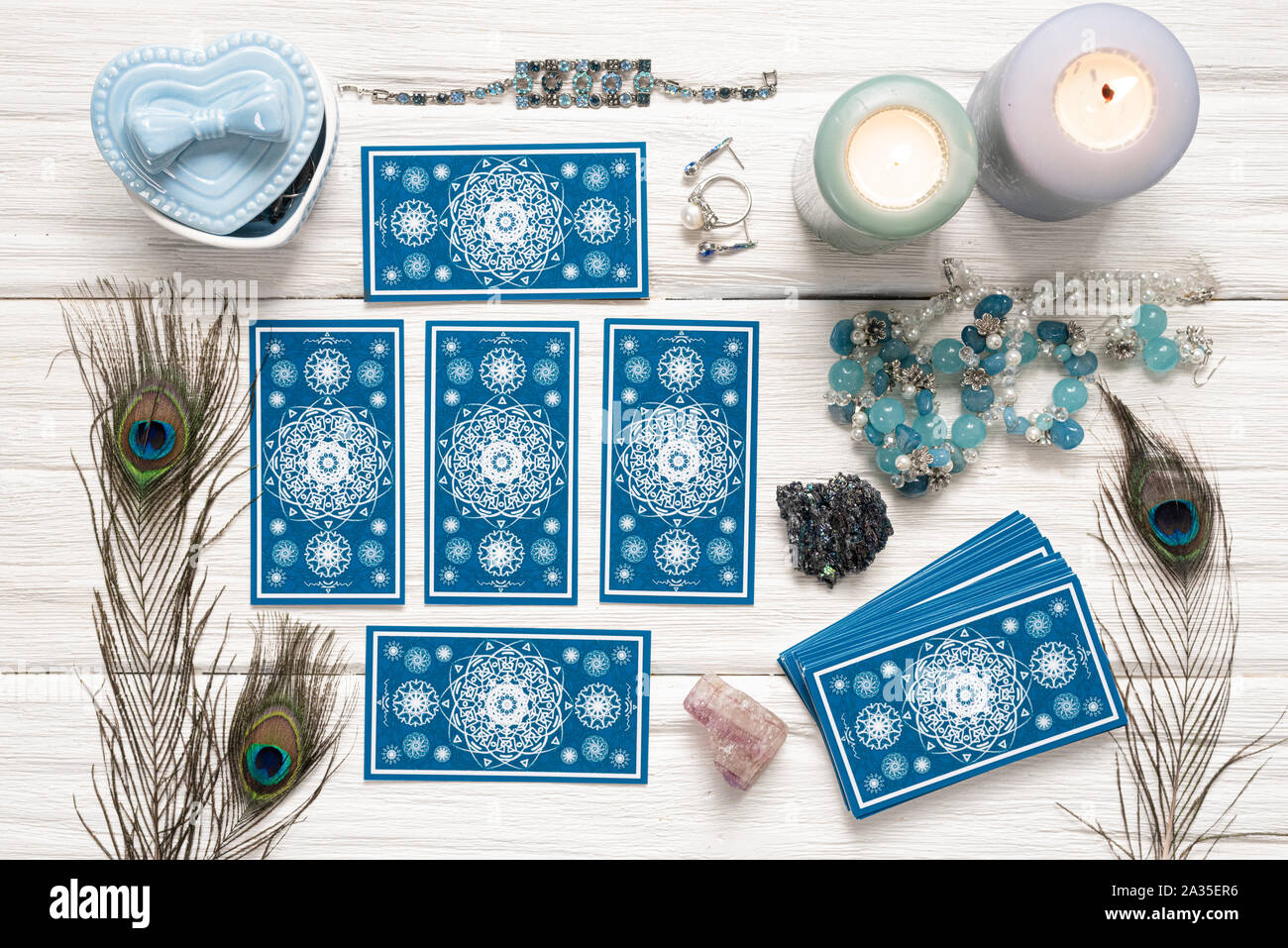 Blue tarot cards on white wooden table background Stock Photo - Alamy