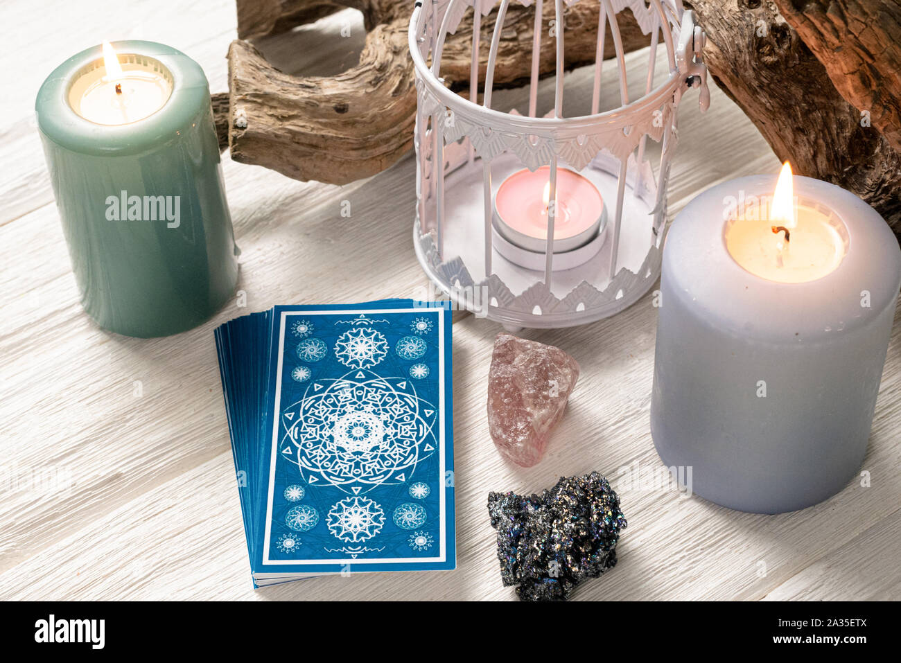 Blue tarot cards on white wooden table background Stock Photo - Alamy