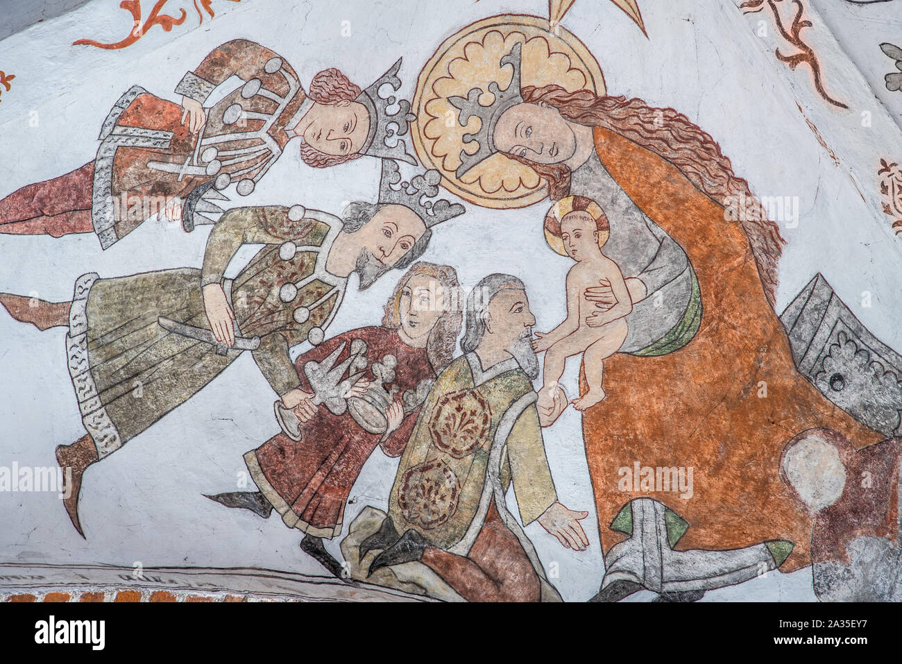 the three holy kings bring gold, frankincense and myrrh to Jesus, a ...