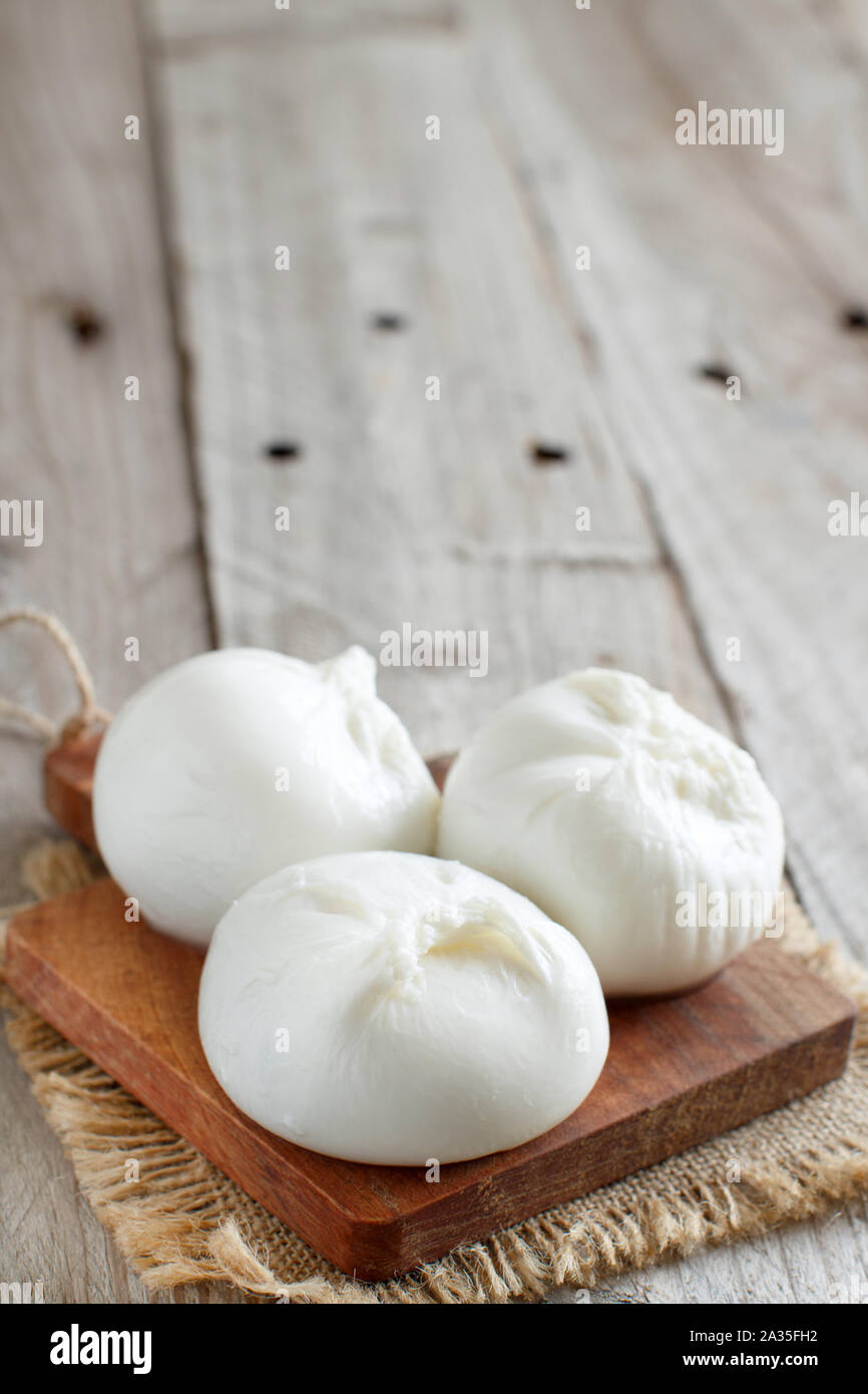 Italian cheese burrata in a bowl close up Stock Photo - Alamy