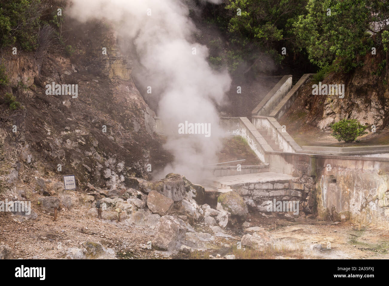 Steam from the hot volcanic springs in the thermal park, jetting among ...