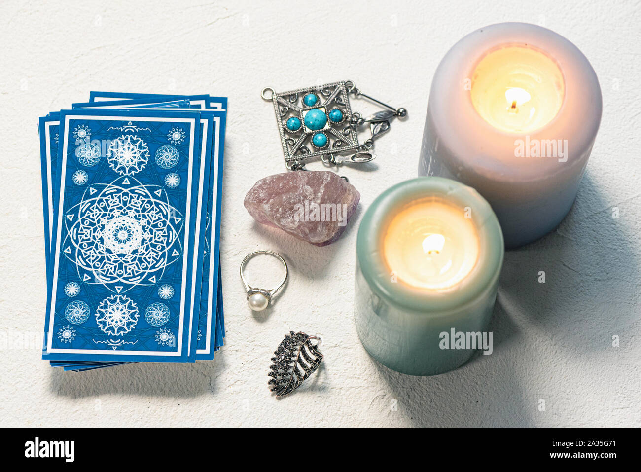 Blue tarot cards on white stone table background Stock Photo - Alamy