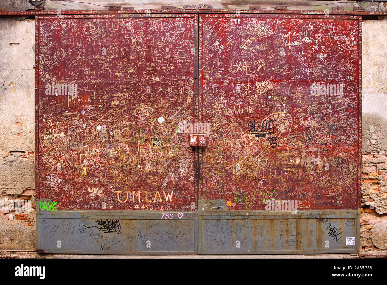 Large metal bridge decorated with thousands of inscriptions, drawings ...