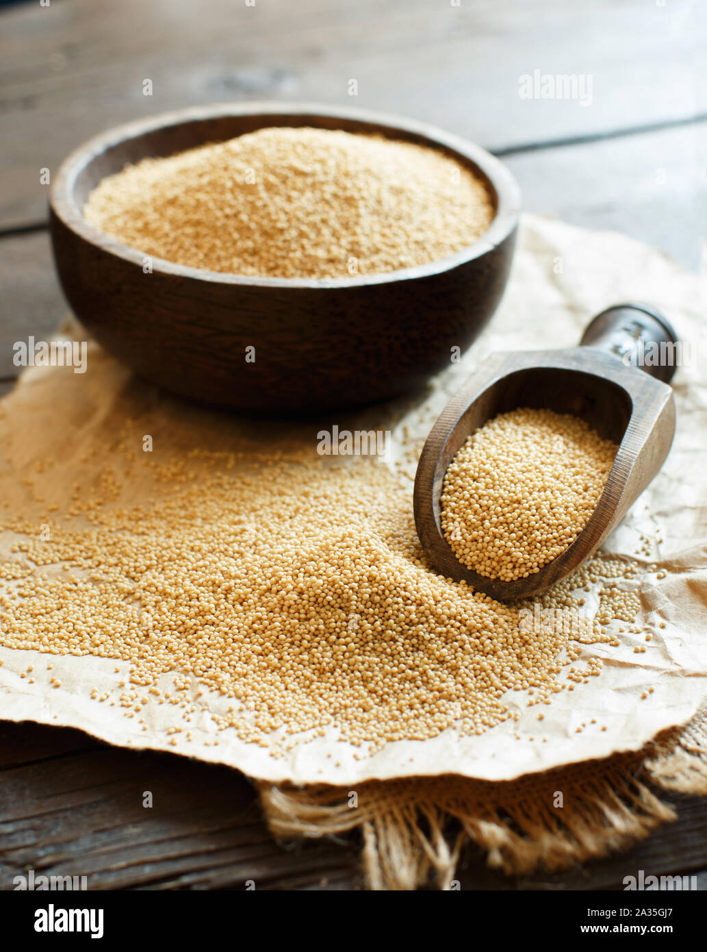 Raw Organic Amaranth grain in a bowl on wooden table Stock Photo - Alamy
