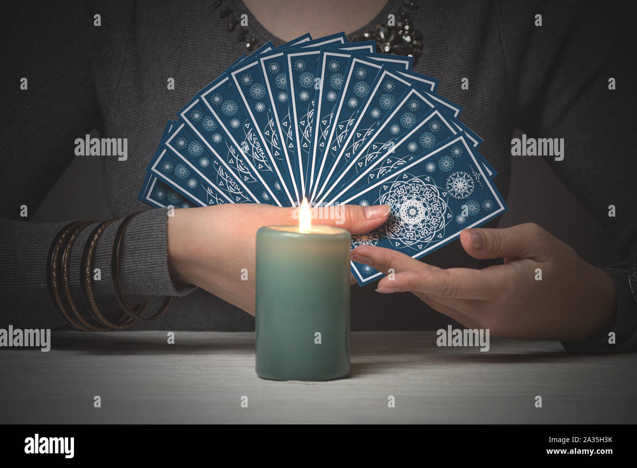 Tarot cards in fortune teller hands. Divination. Future reading Stock ...