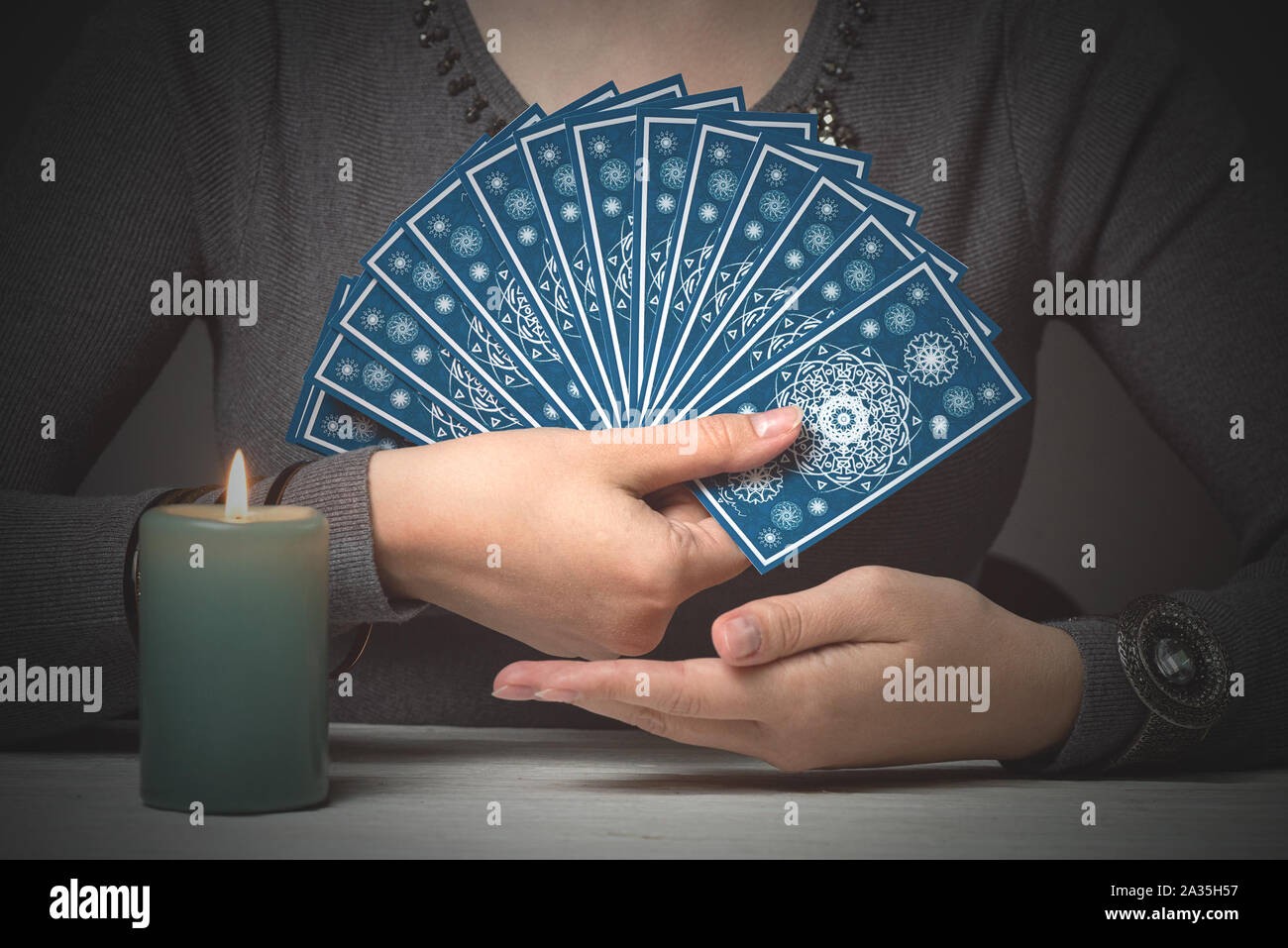 Tarot cards in fortune teller hands. Divination. Future reading Stock ...