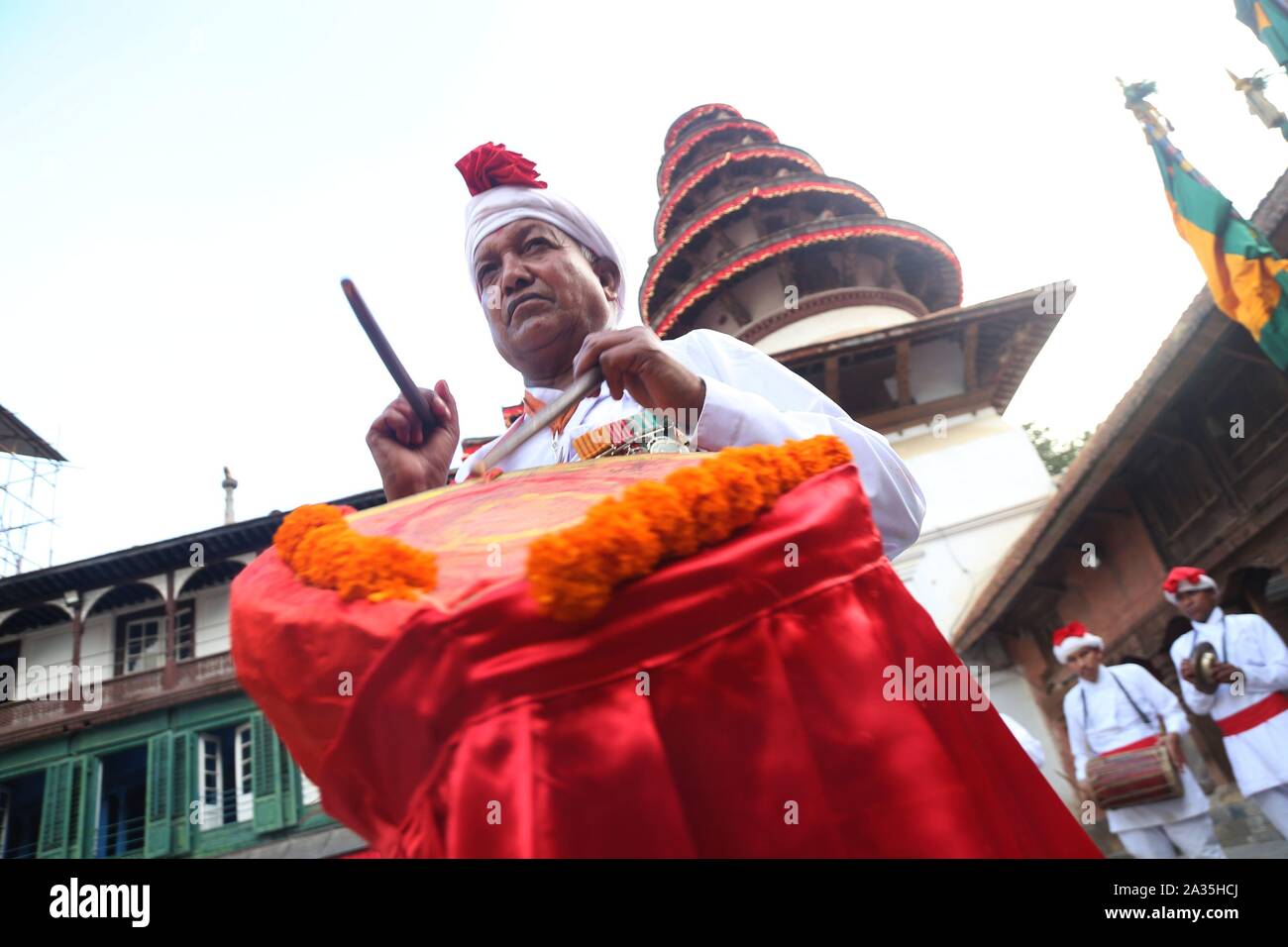 Kathmandu, Nepal. 5th Oct, 2019. A man in traditional attire plays ...