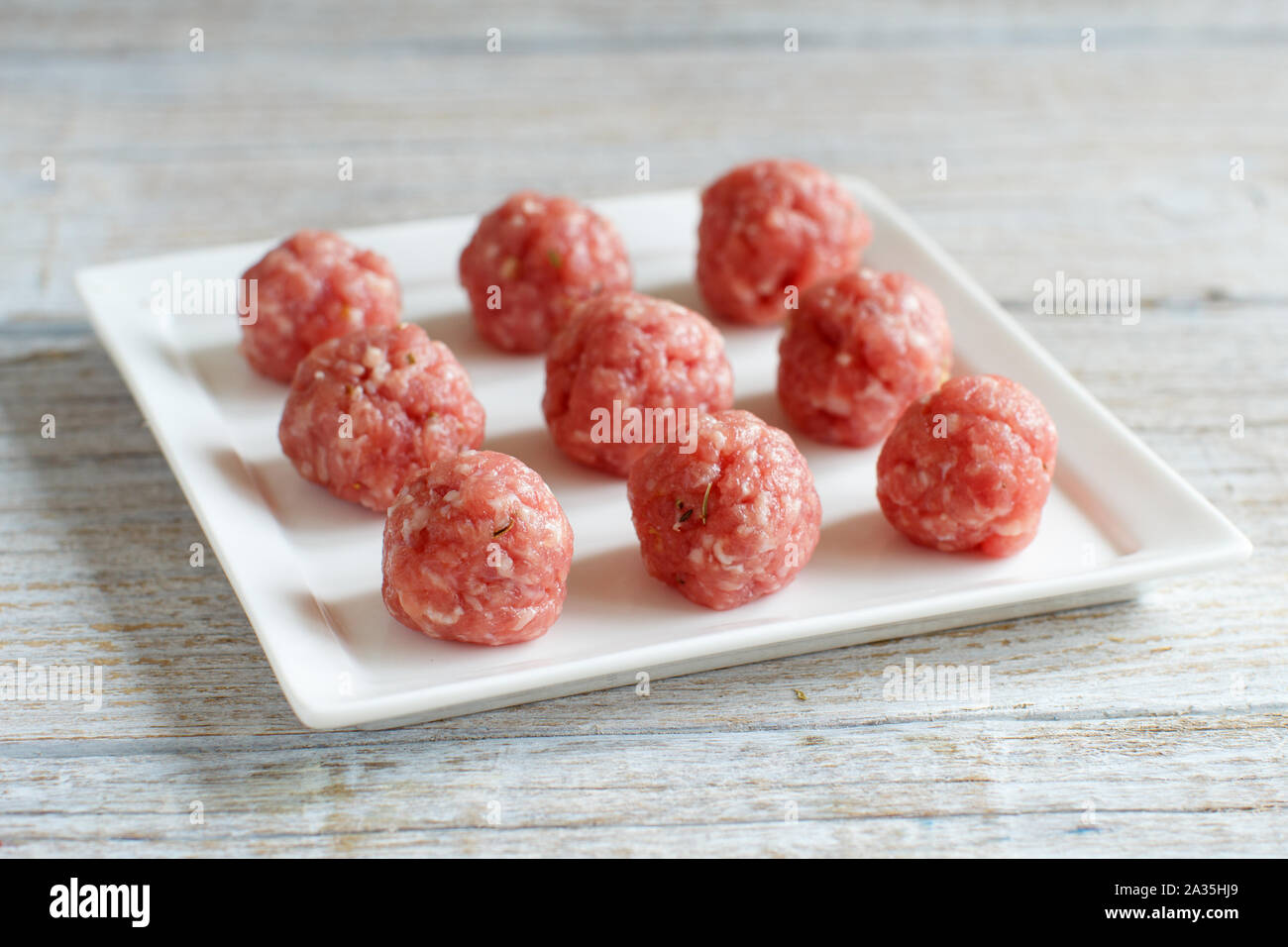 Raw meatballs are ready to cook Stock Photo - Alamy