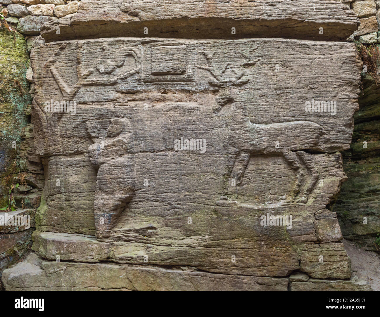 Ancient relief depicting a sacred deer and a pregnant woman praying to ...