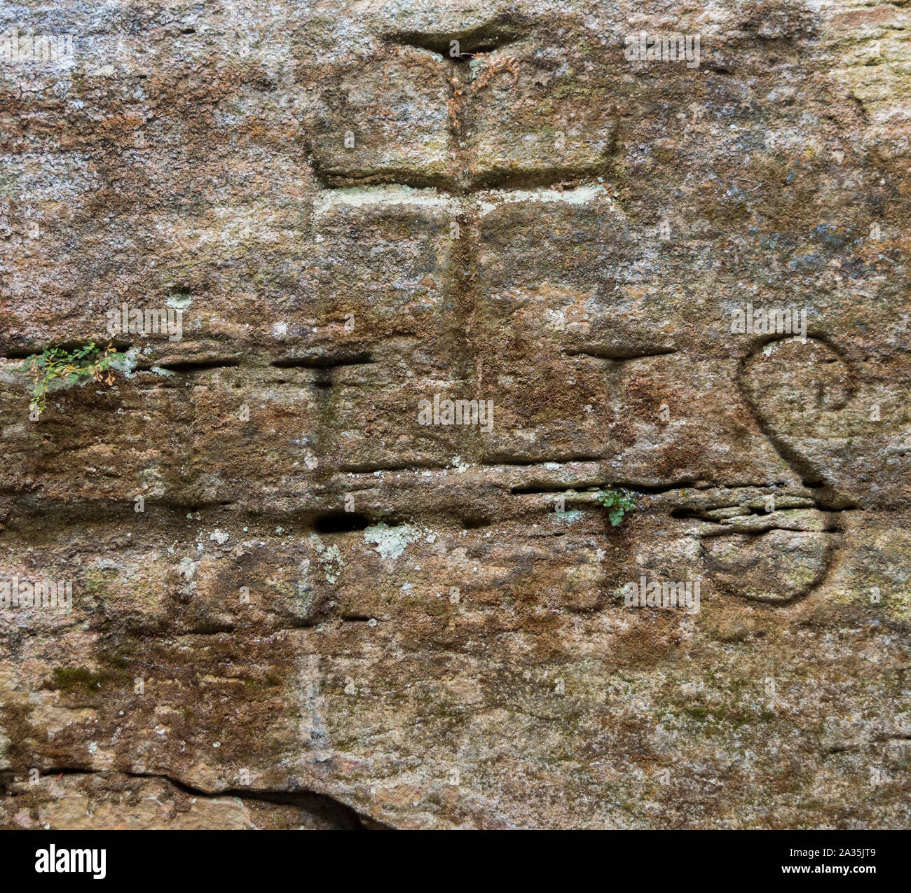 Medieval Cross Carved into Stone Wall Stock Photo - Alamy