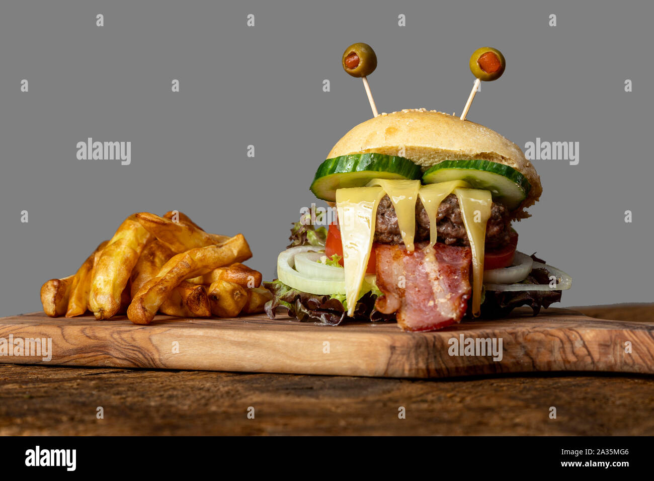 monster burger for halloween on wood Stock Photo - Alamy