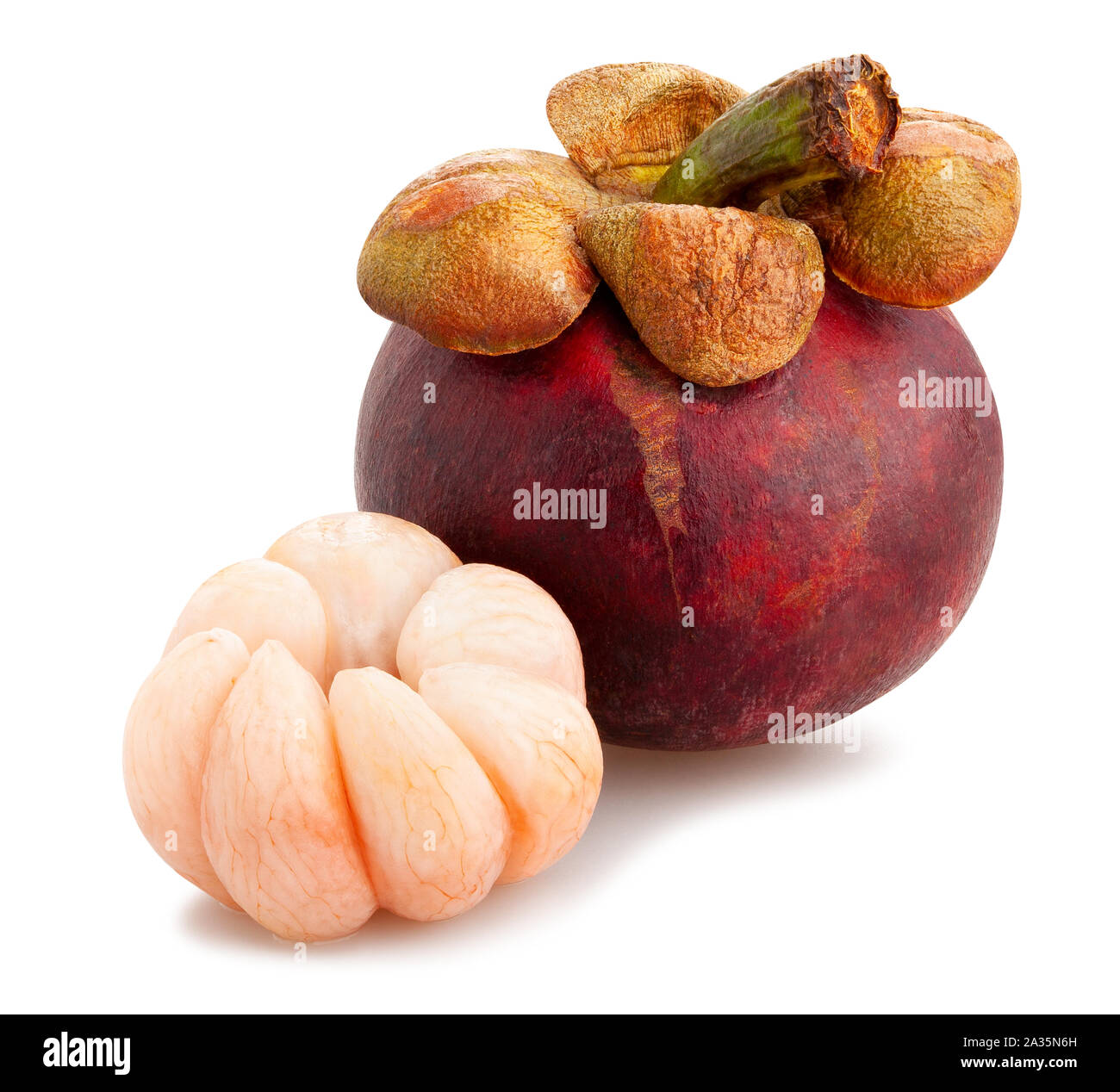 peeled open mangosteen path isolated on white Stock Photo - Alamy