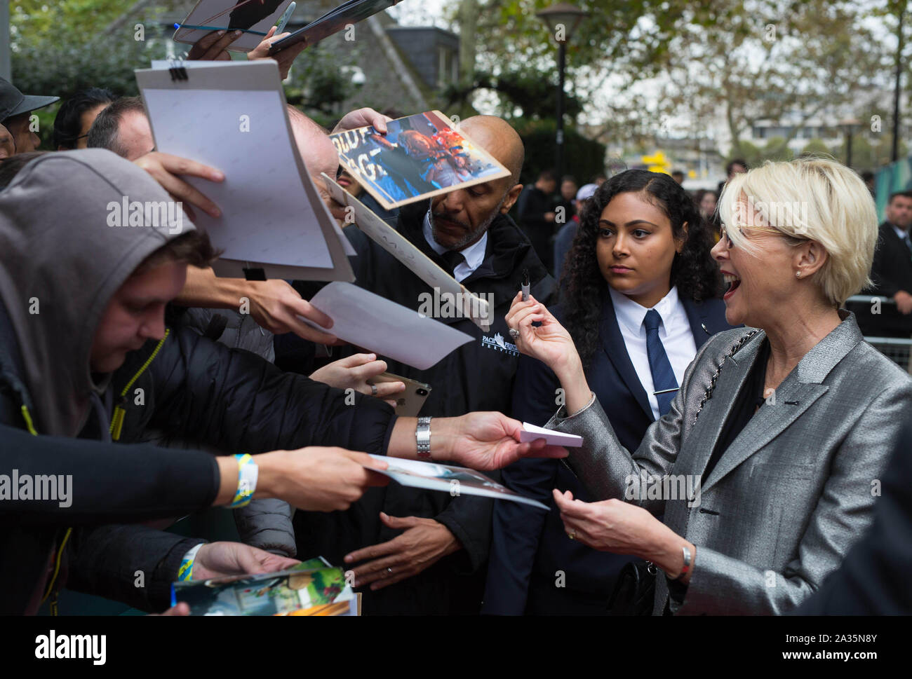 Annette Bening signs autographs as she arrives for The Report premiere ...