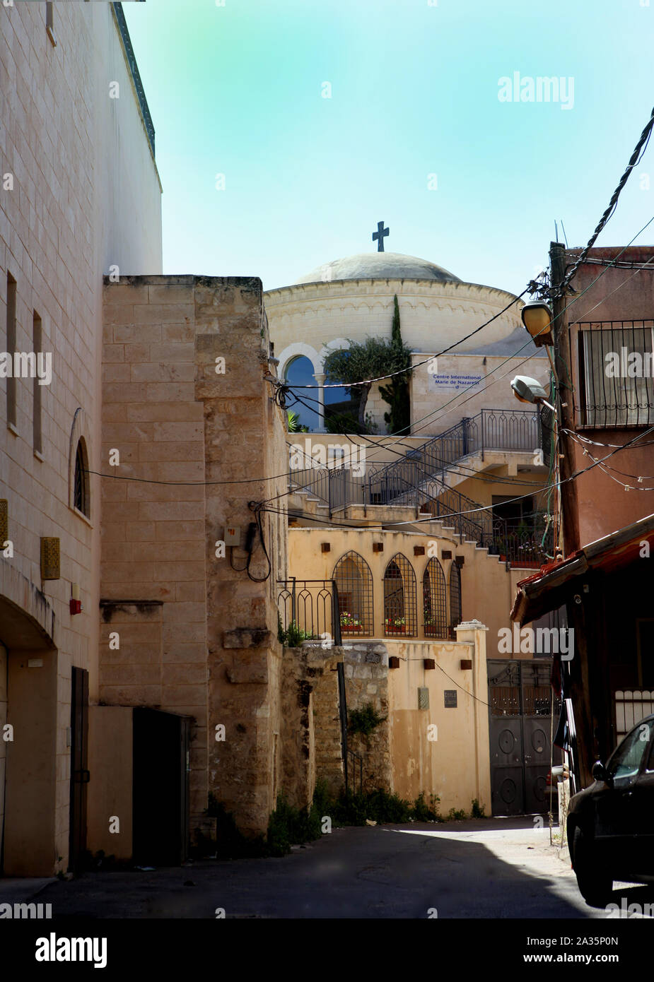 Nazareth, ISRAEL - 10 May 2019: Narrow street with colorful lanterns ...