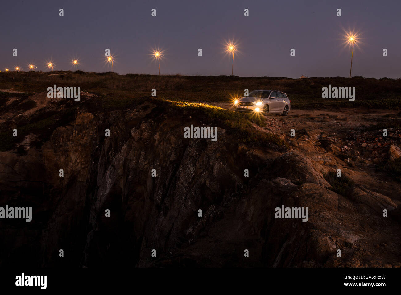illuminated car at the coast in Portugal Stock Photo - Alamy