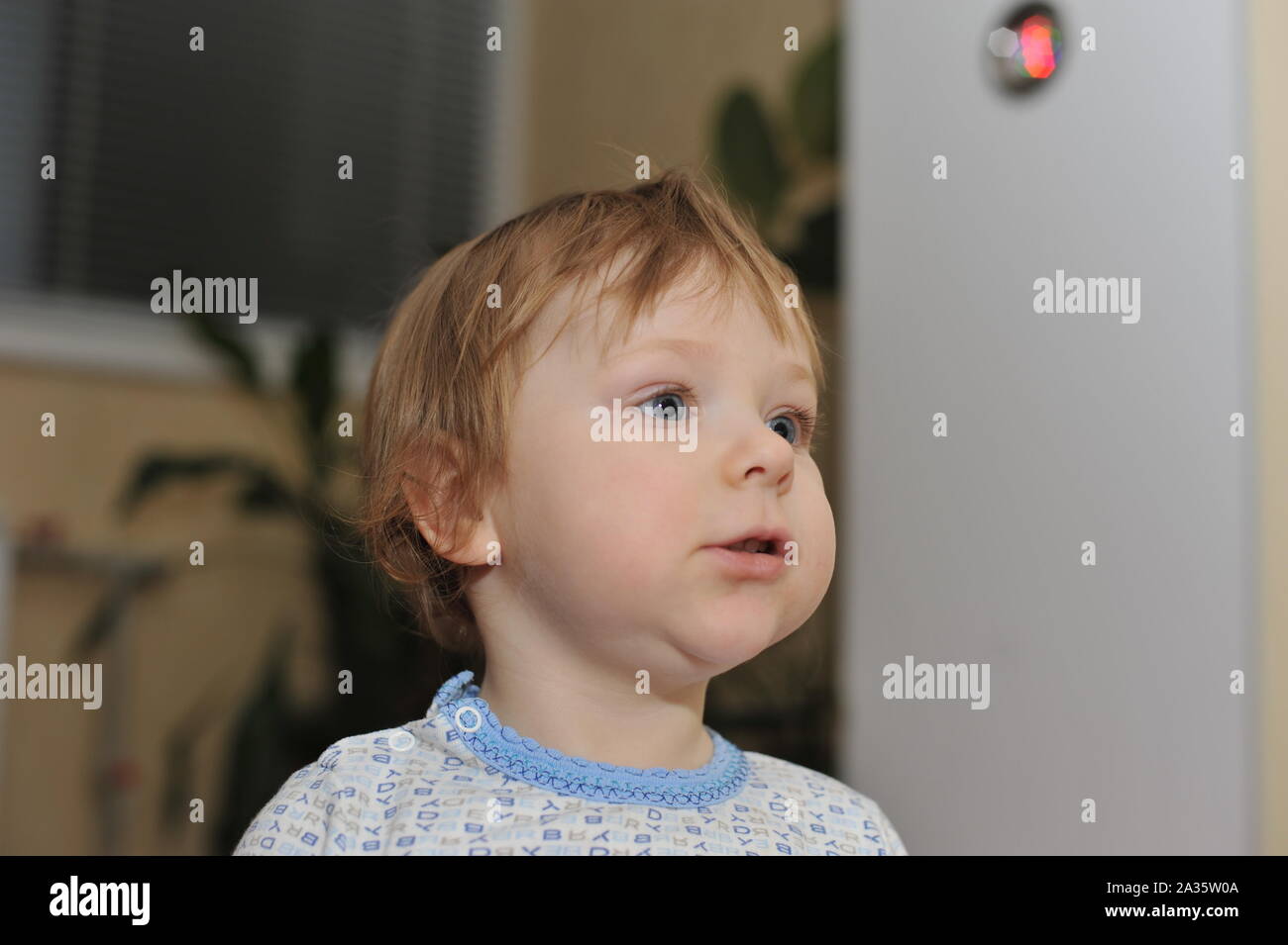 Little todler baby girl having fun indoor the room Stock Photo - Alamy