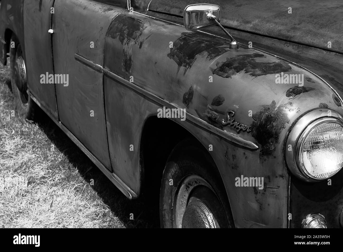 The side of a brown 1956 Singer Hunter on display at a car show Stock ...
