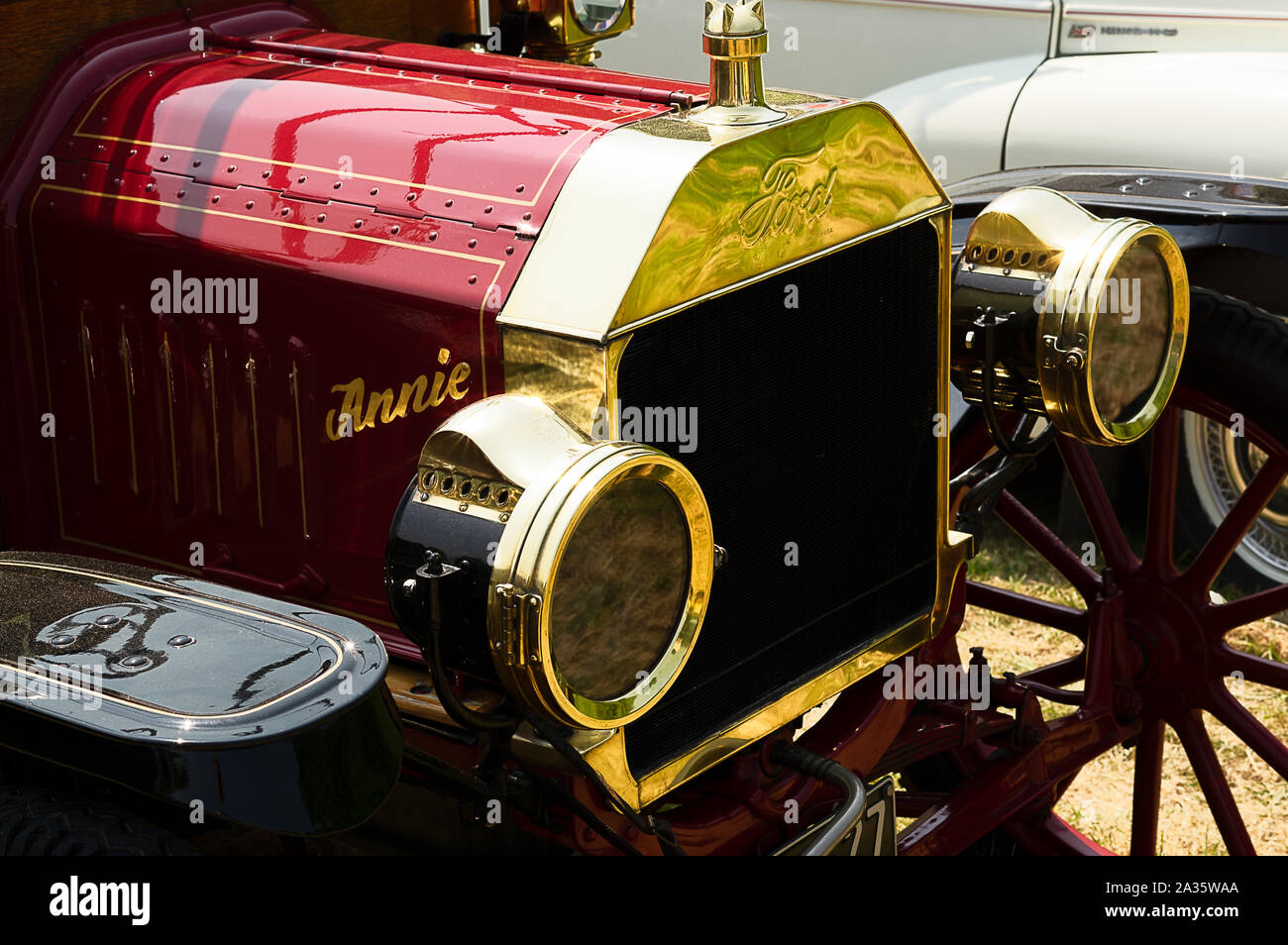 The front of a red Ford Model T on display at a car show Stock Photo ...
