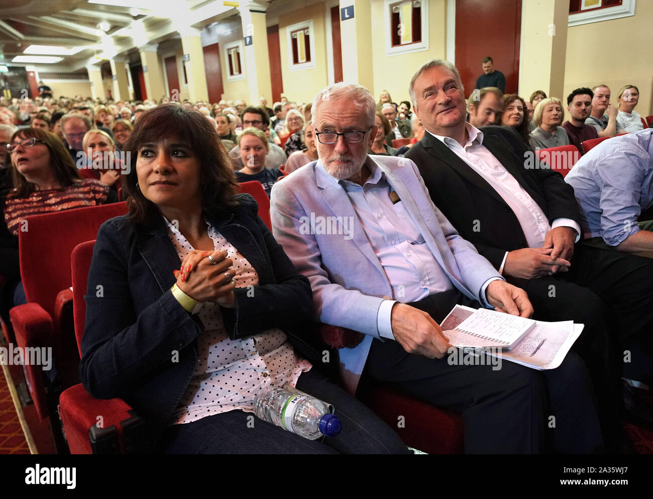 Labour leader Jeremy Corbyn (centre) with his wife Laura Alvarez (left ...