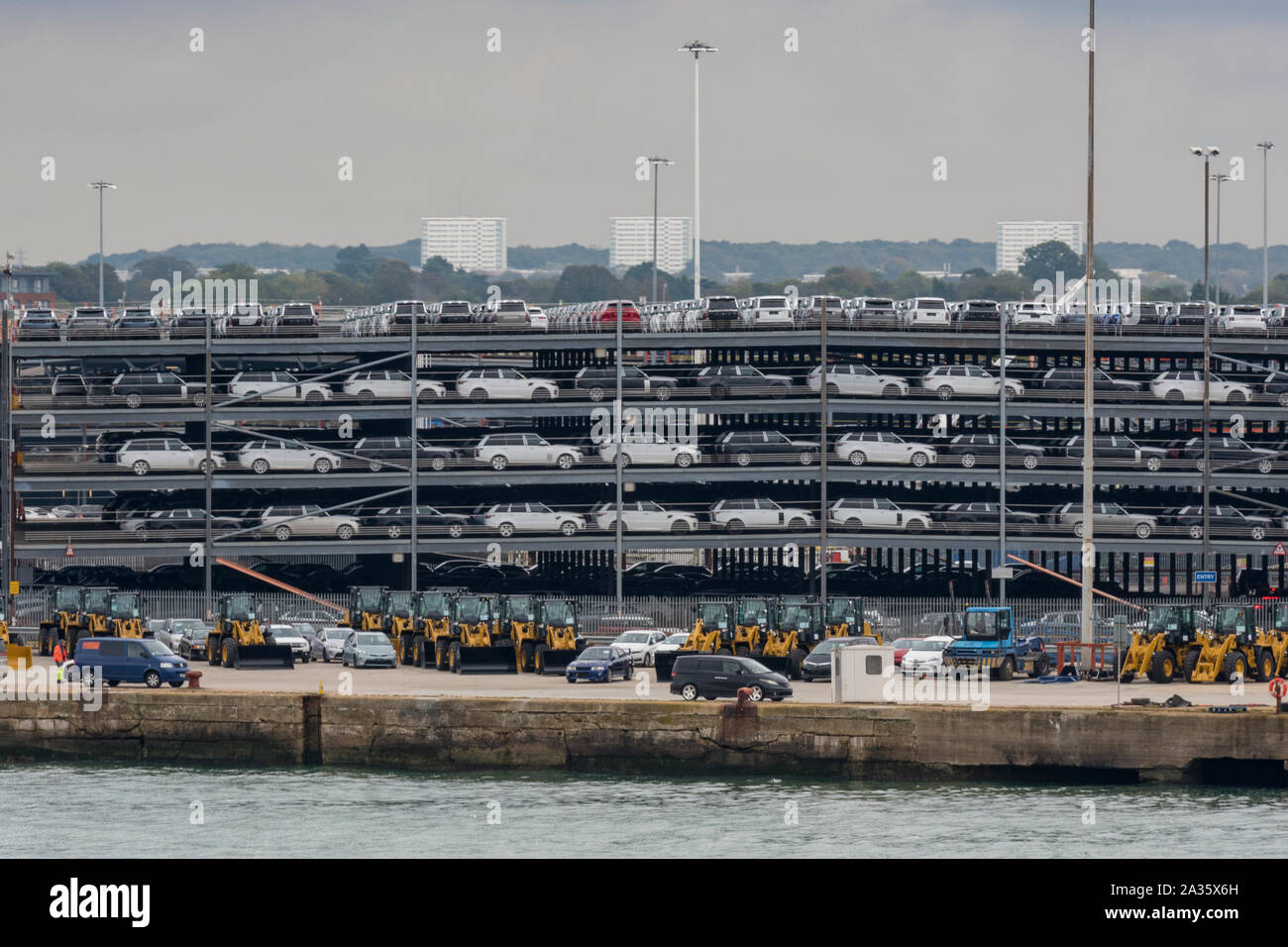 The port of Southampton docks with cars and machinery ready to be ...