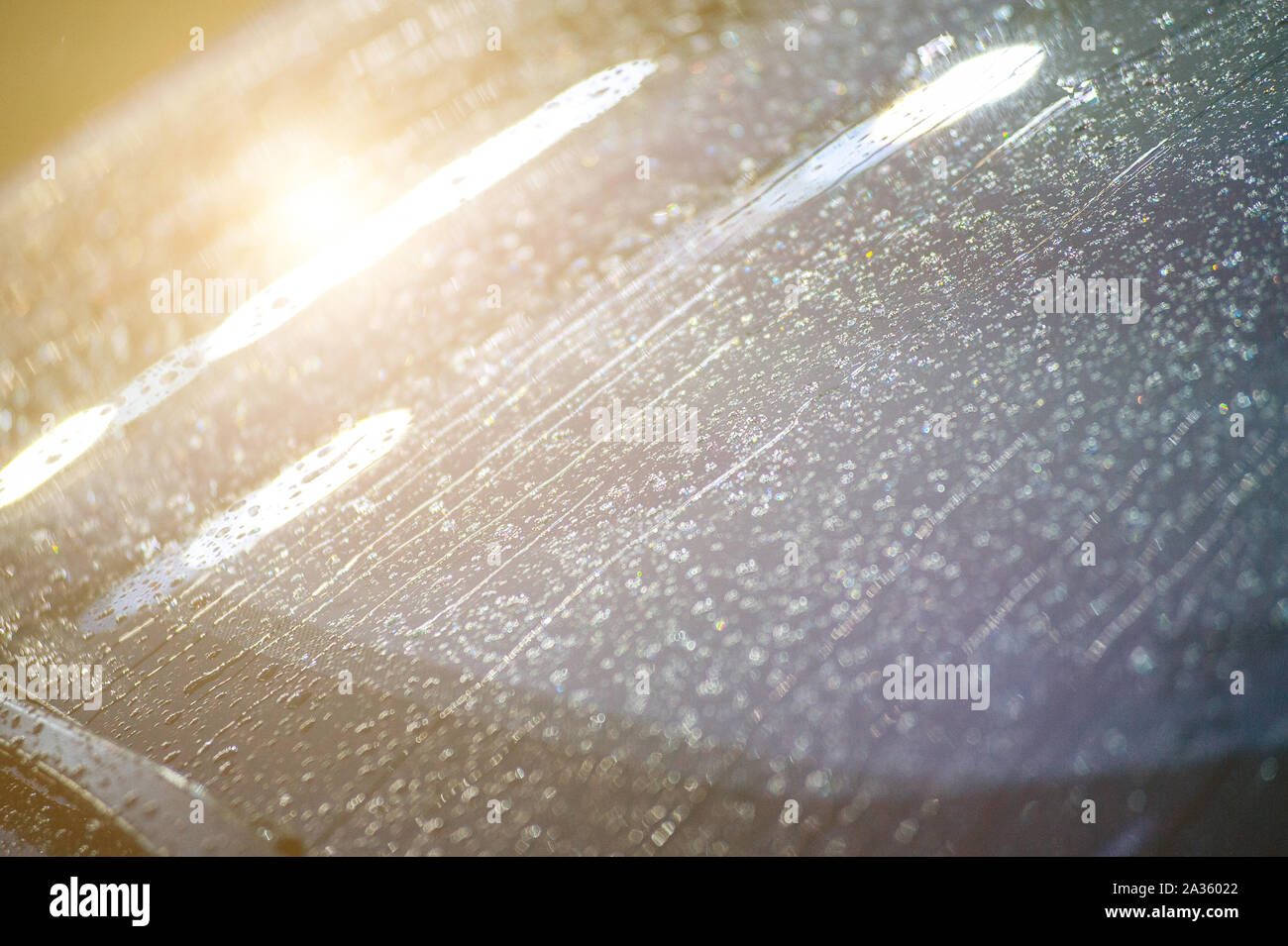 Closeup. Rain and drops on the modern car windshield Stock Photo - Alamy