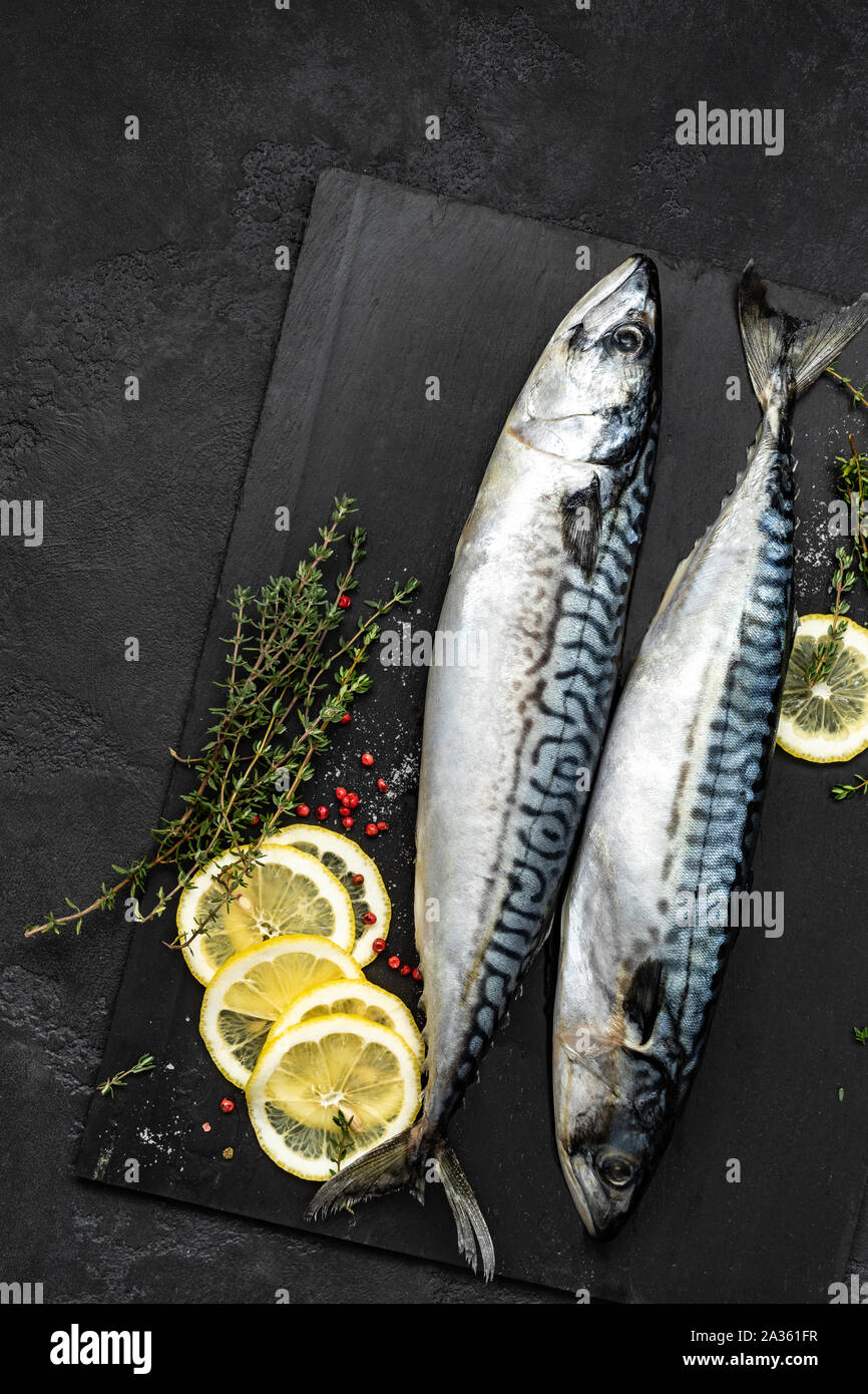 Mackerel. Fresh raw fish with ingredients for cooking, top view, flat ...