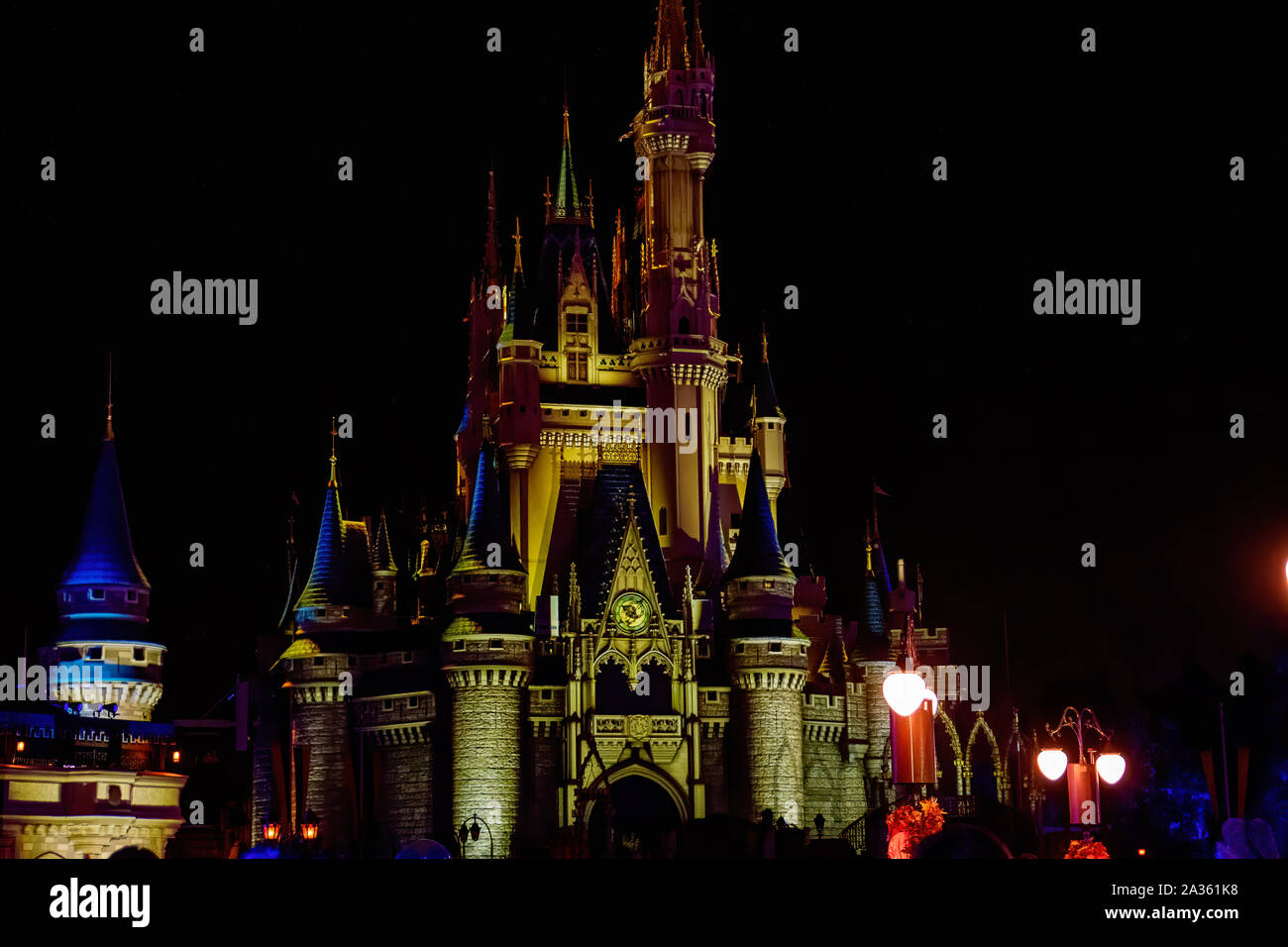 Night colour projections on Cinderella Castle at Disney Stock Photo - Alamy