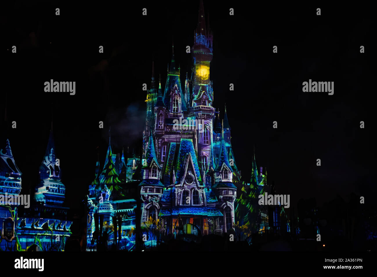 Night colour projections on Cinderella Castle from the Halloween party ...
