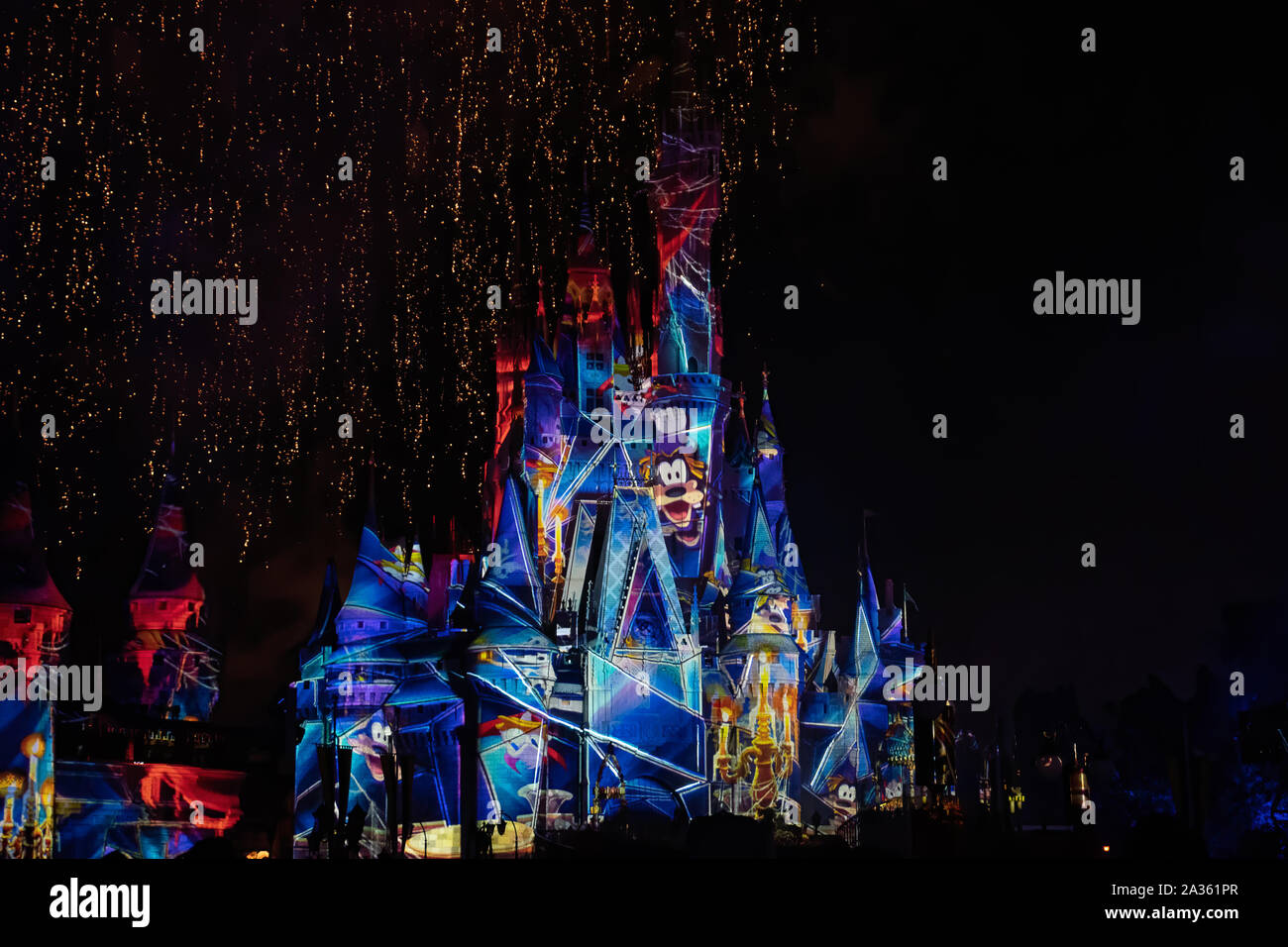 Night colour projections on Cinderella Castle from the Halloween party ...