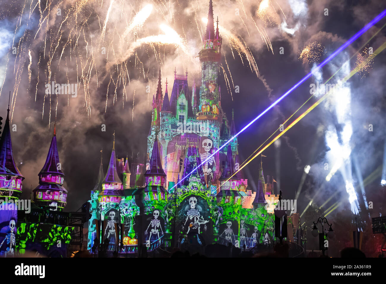Night colour projections on Cinderella Castle from the Halloween party ...