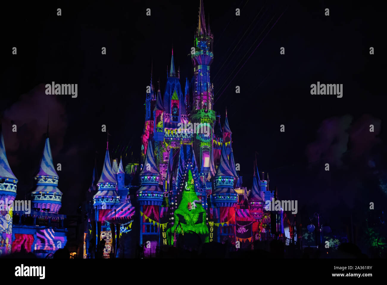 Night colour projections on Cinderella Castle from the Halloween party ...