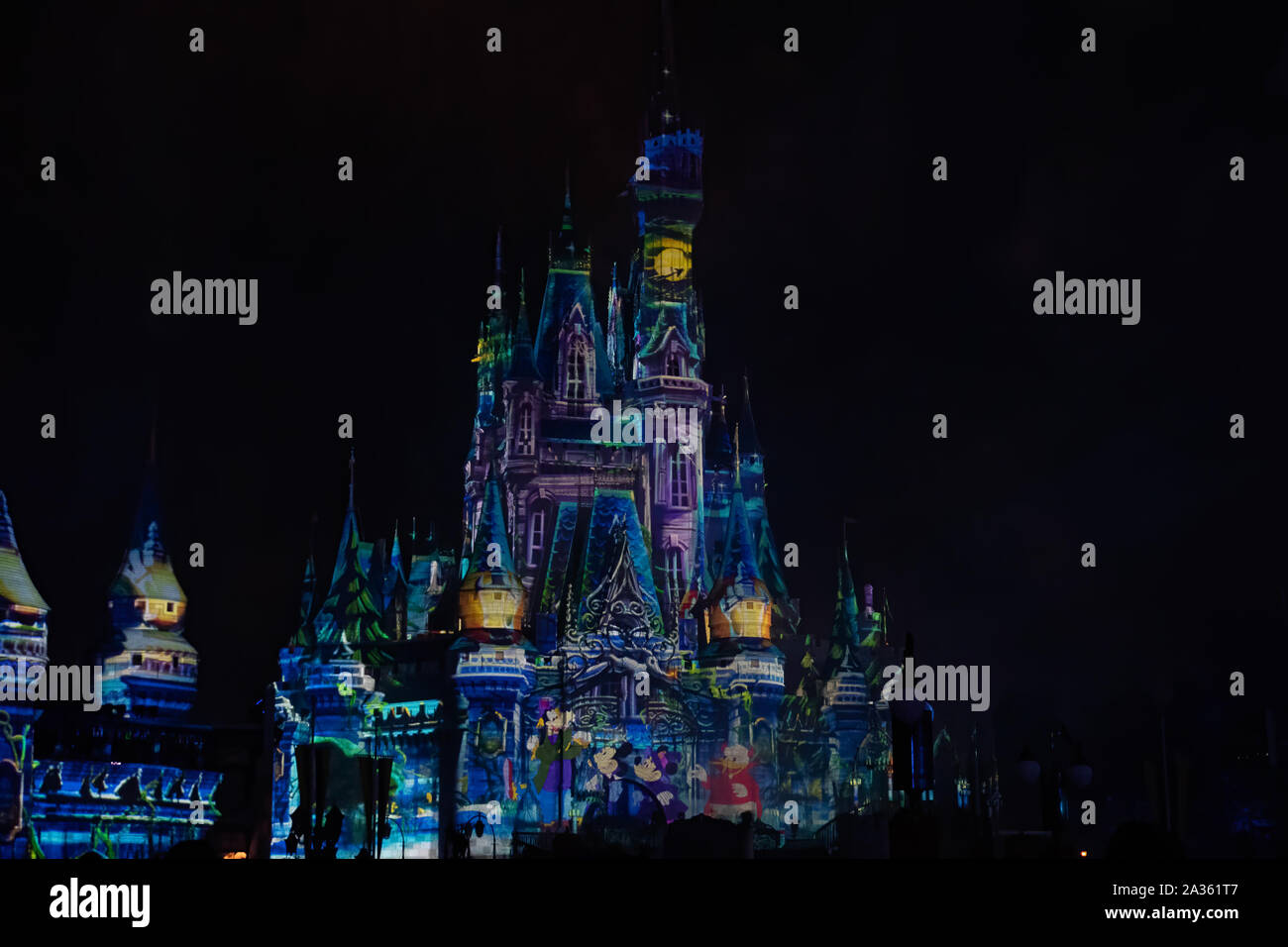 Night colour projections on Cinderella Castle from the Halloween party ...