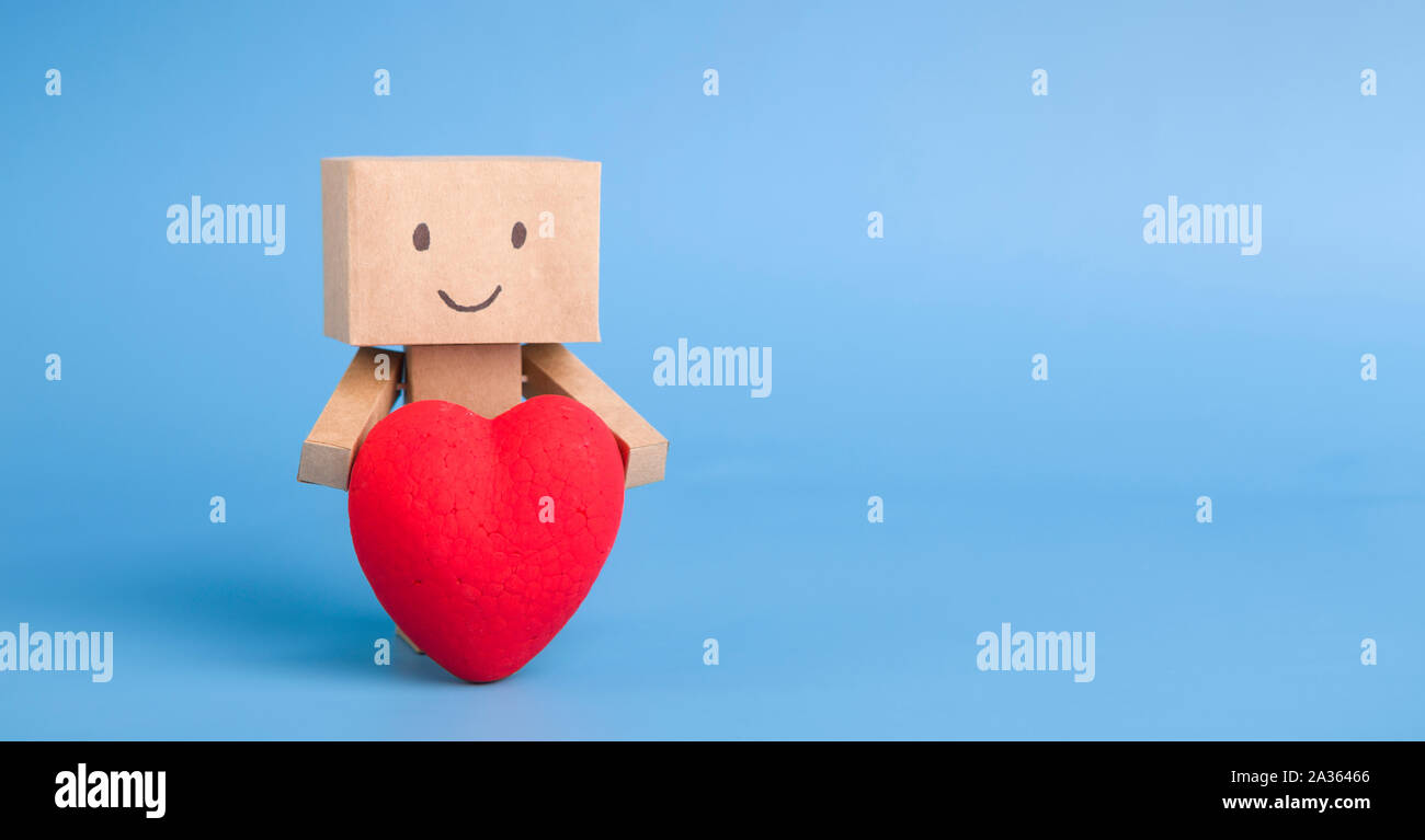 Cute little robot embracing red heart, blue panorama background Stock ...