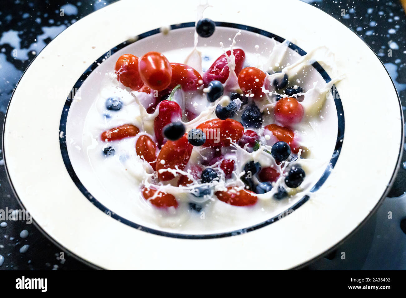 Fruit Milk Splash Stock Photo - Alamy