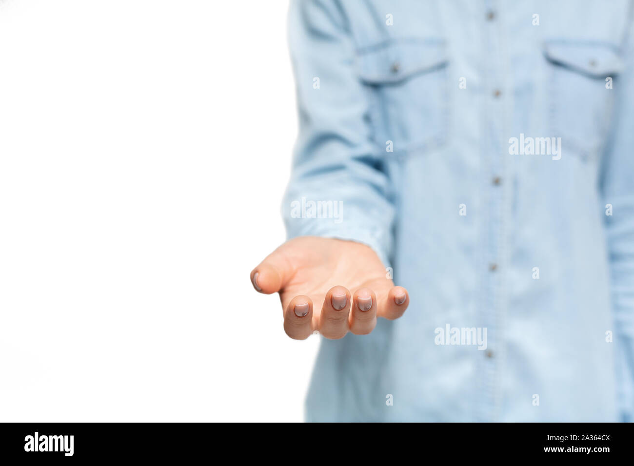 Female extending arm to give or ask for support Stock Photo - Alamy