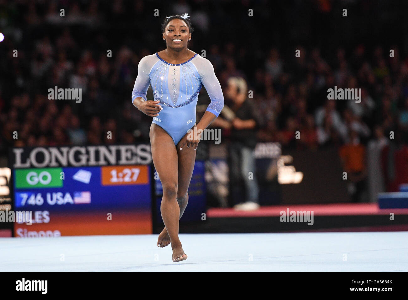 Stuttgart, Germany. 5th Oct, 2019. SIMONE BILES jogs off the floor ...