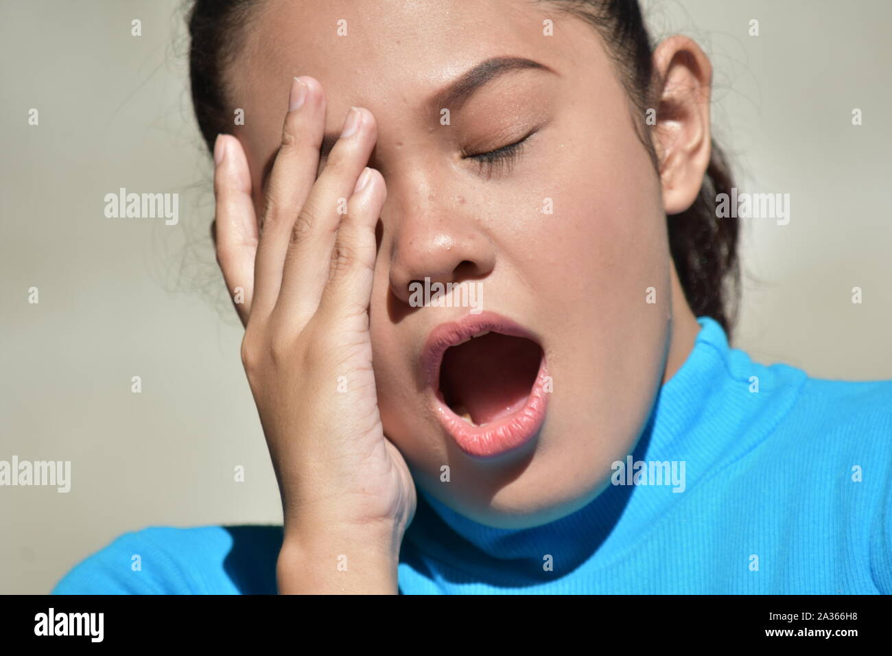 An A Tired Minority Person Stock Photo - Alamy
